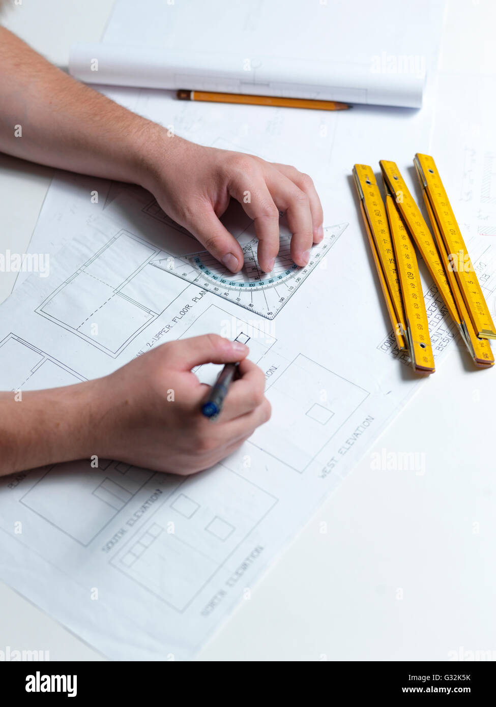 Business man draw buildings and present his architectural project Stock ...