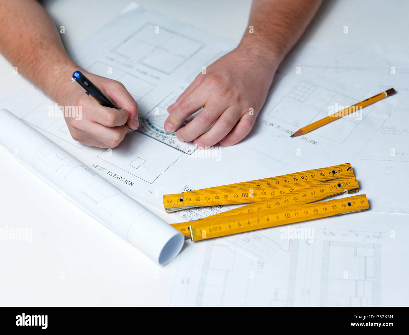Business man draw buildings and present his architectural project Stock ...