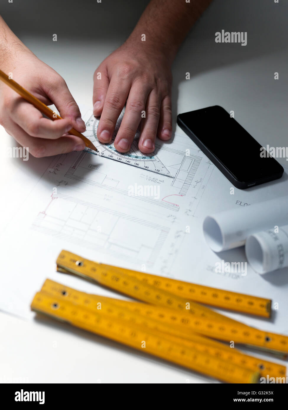 Business man draw buildings and present his architectural project Stock ...