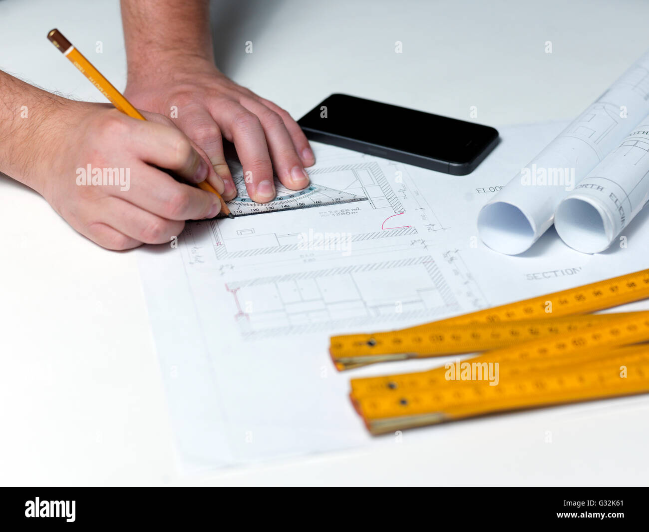 Business man draw buildings and present his architectural project Stock ...