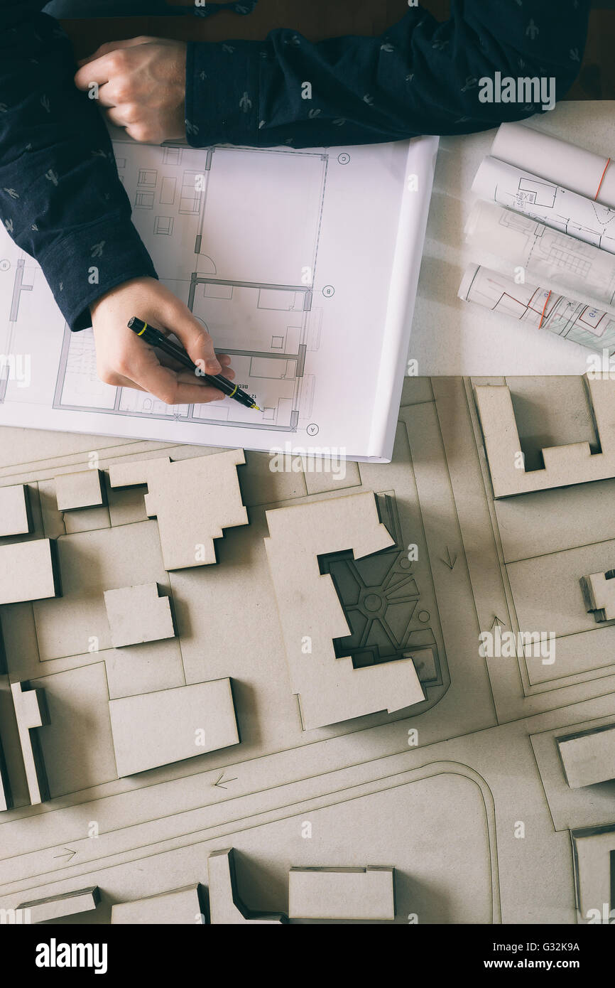 Top view of architect drawing on architectural project Stock Photo - Alamy