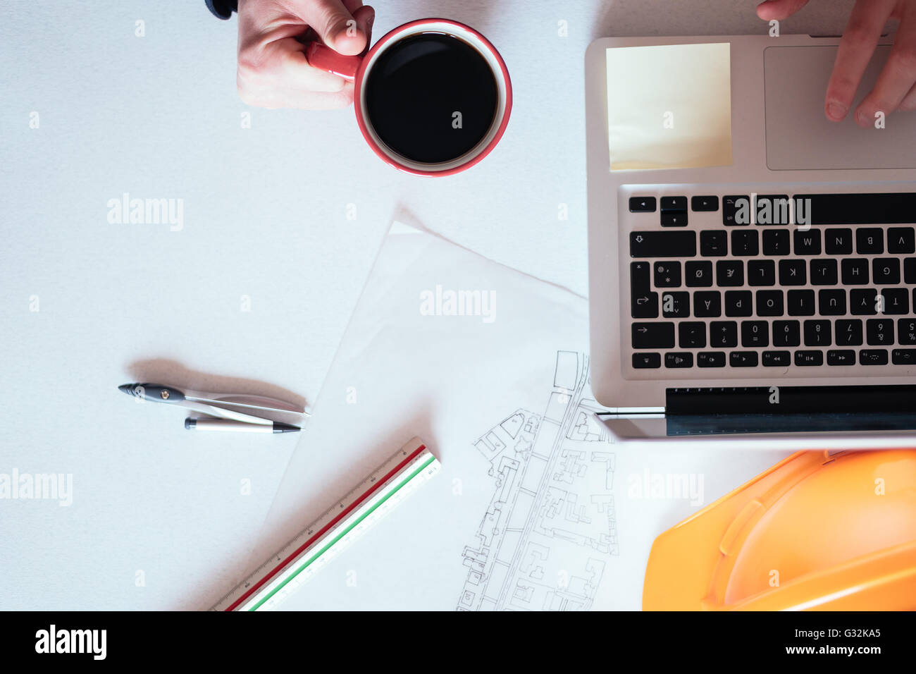 Top view of architect drawing on architectural project Stock Photo - Alamy