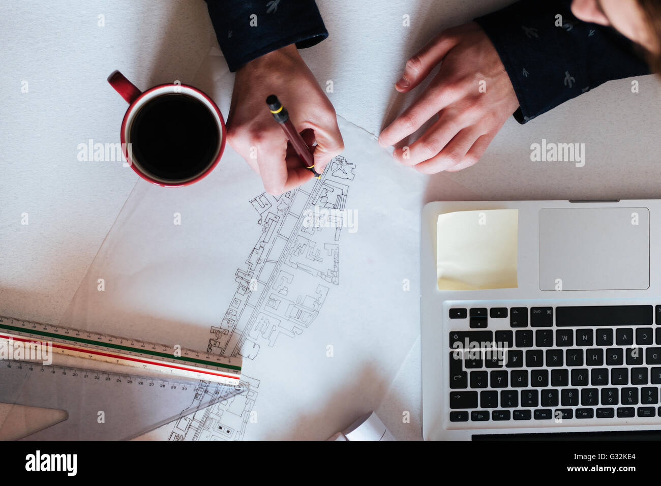 Top view of architect drawing on architectural project Stock Photo - Alamy