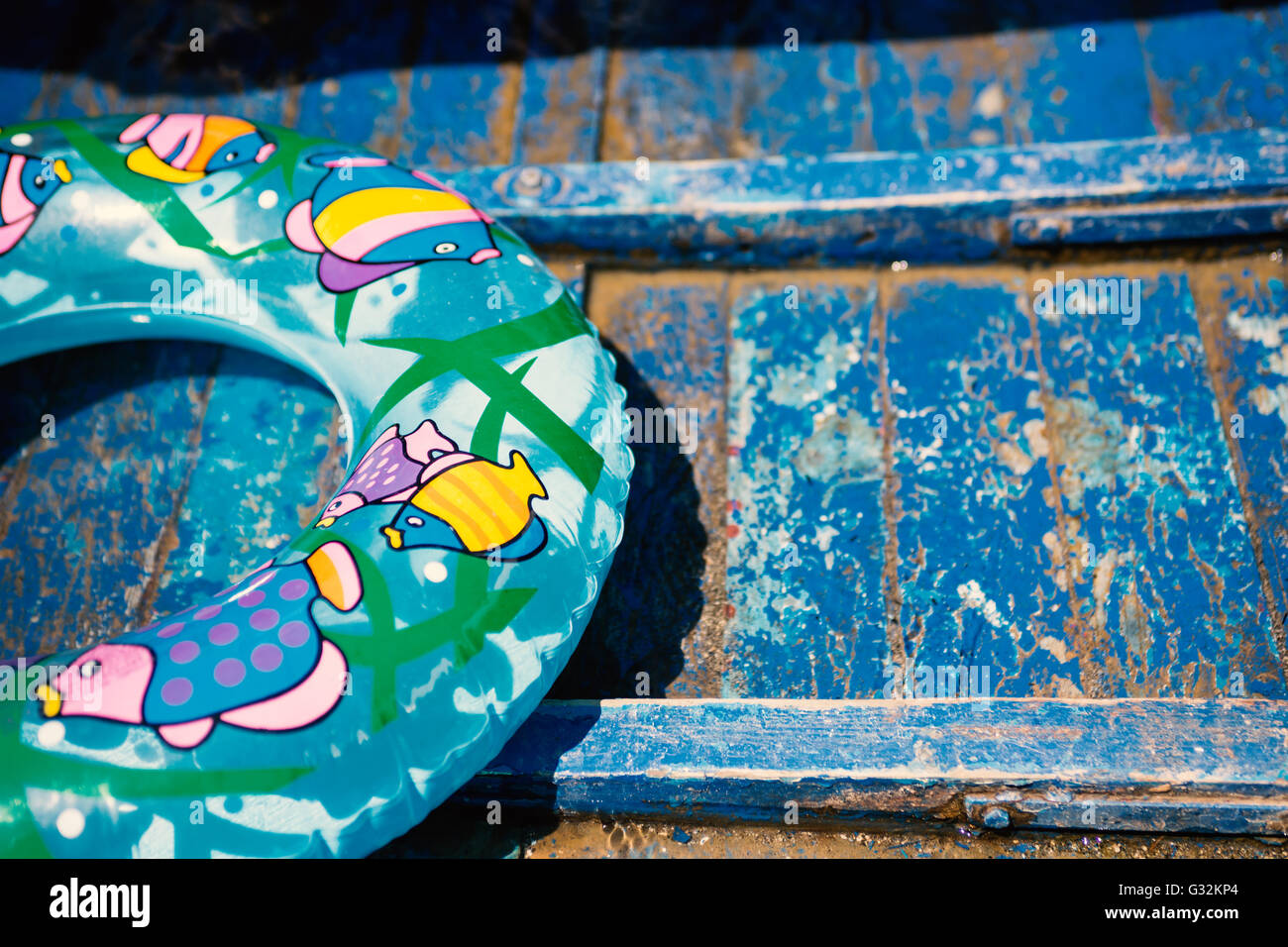 swimming circle on rustic boat Stock Photo - Alamy