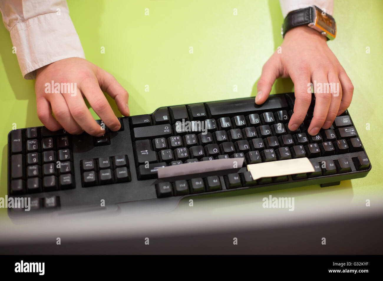 Closeup of a man using computer Stock Photo - Alamy