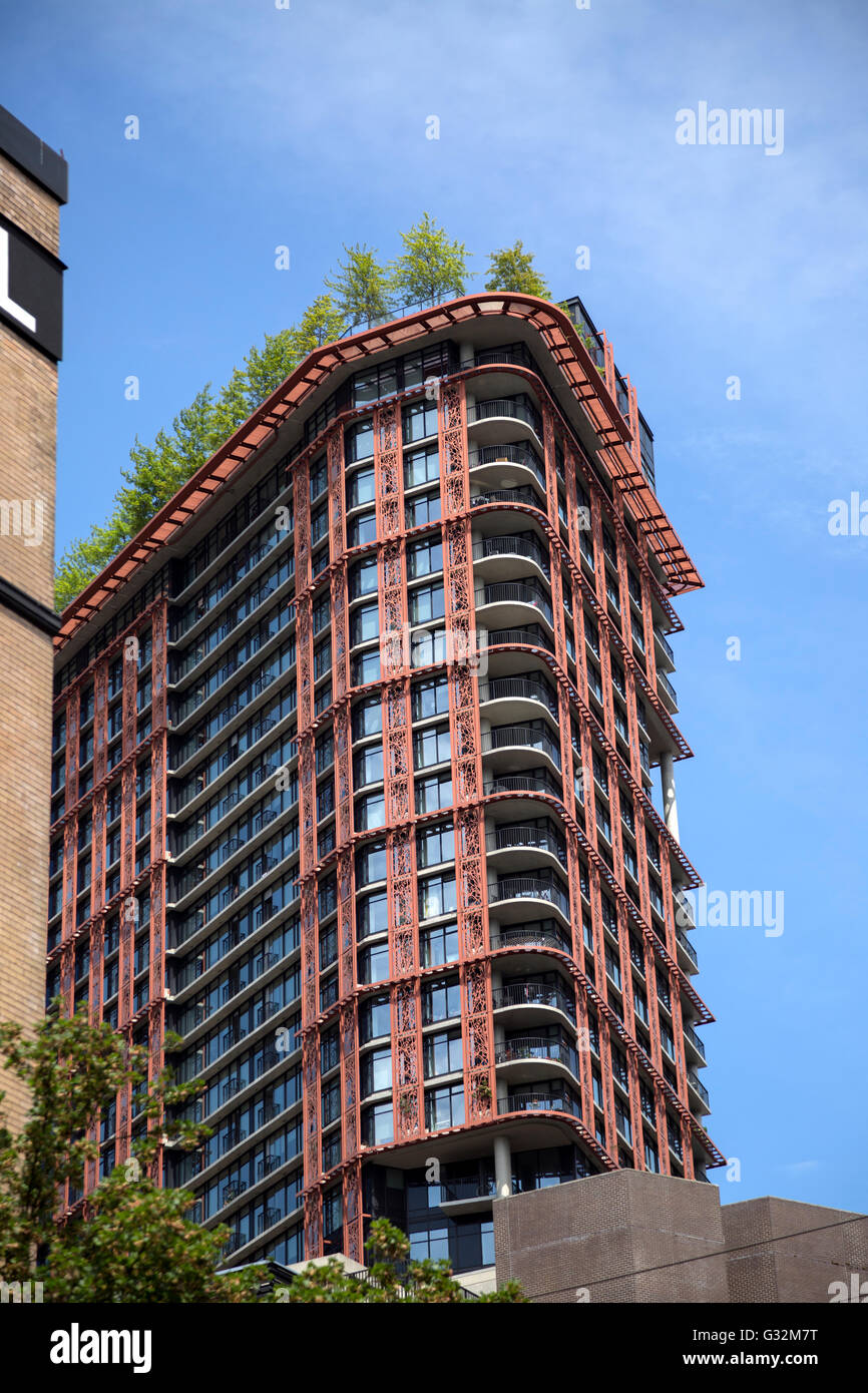 skyscraper with trees on top Stock Photo - Alamy