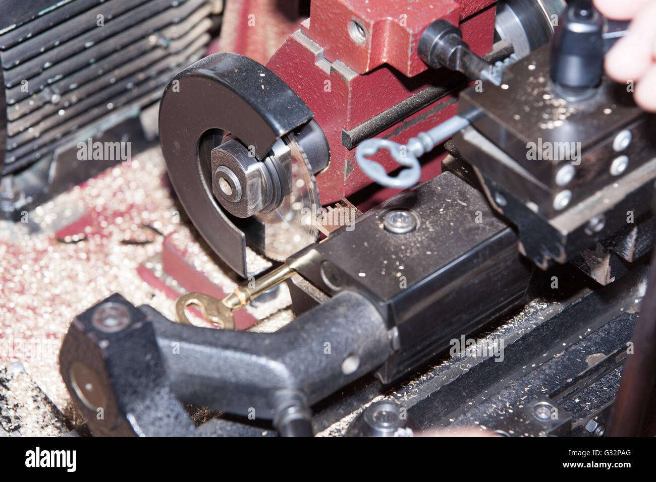 make a metal key locksmith Stock Photo - Alamy