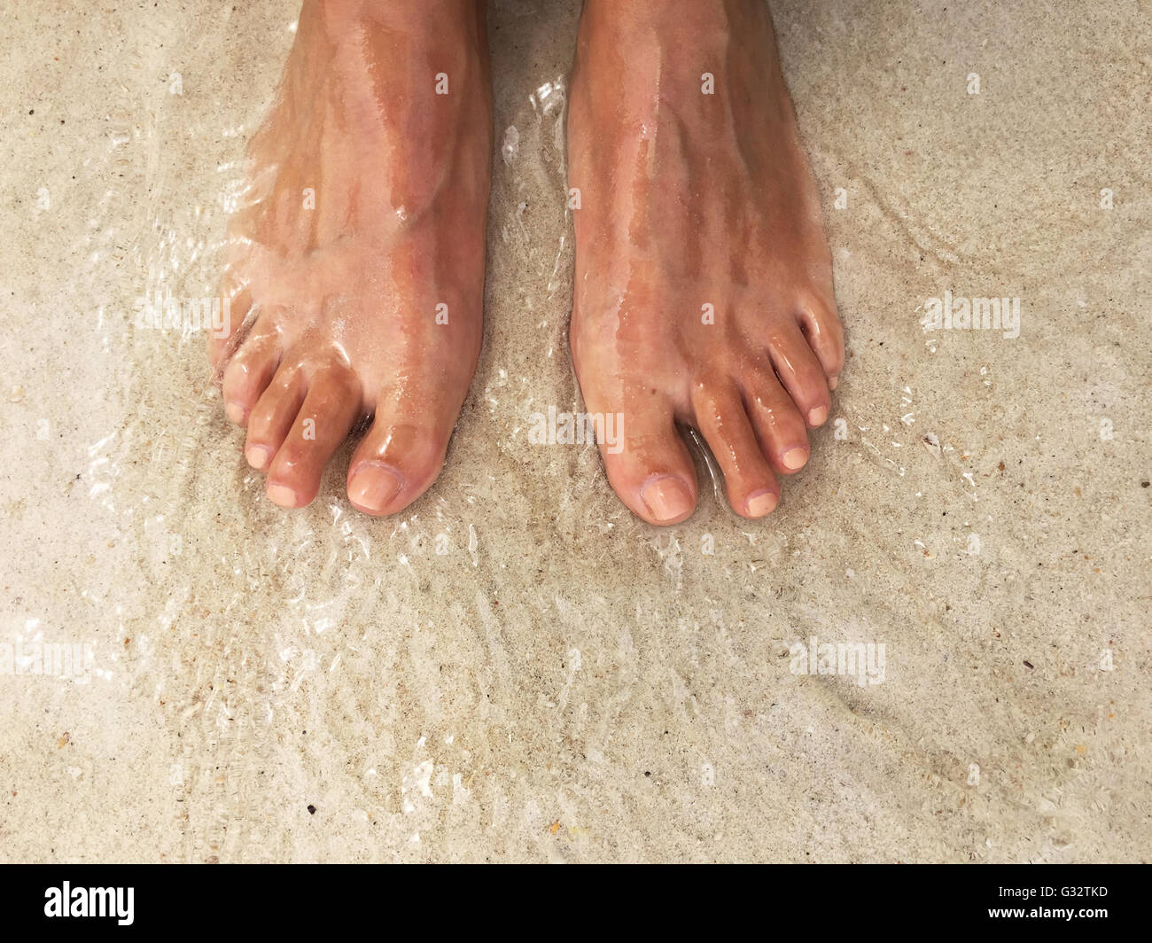 Feet in sea hi-res stock photography and images - Alamy