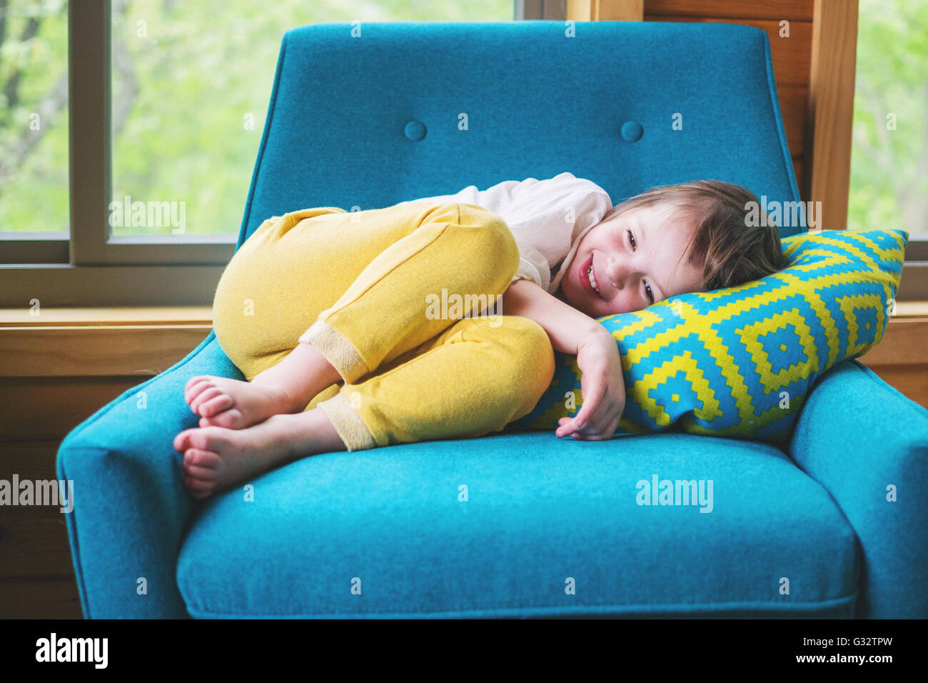 Curled up person hi-res stock photography and images - Alamy