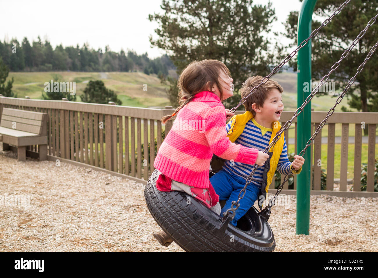 Boy girl brother sister playground hi-res stock photography and images ...