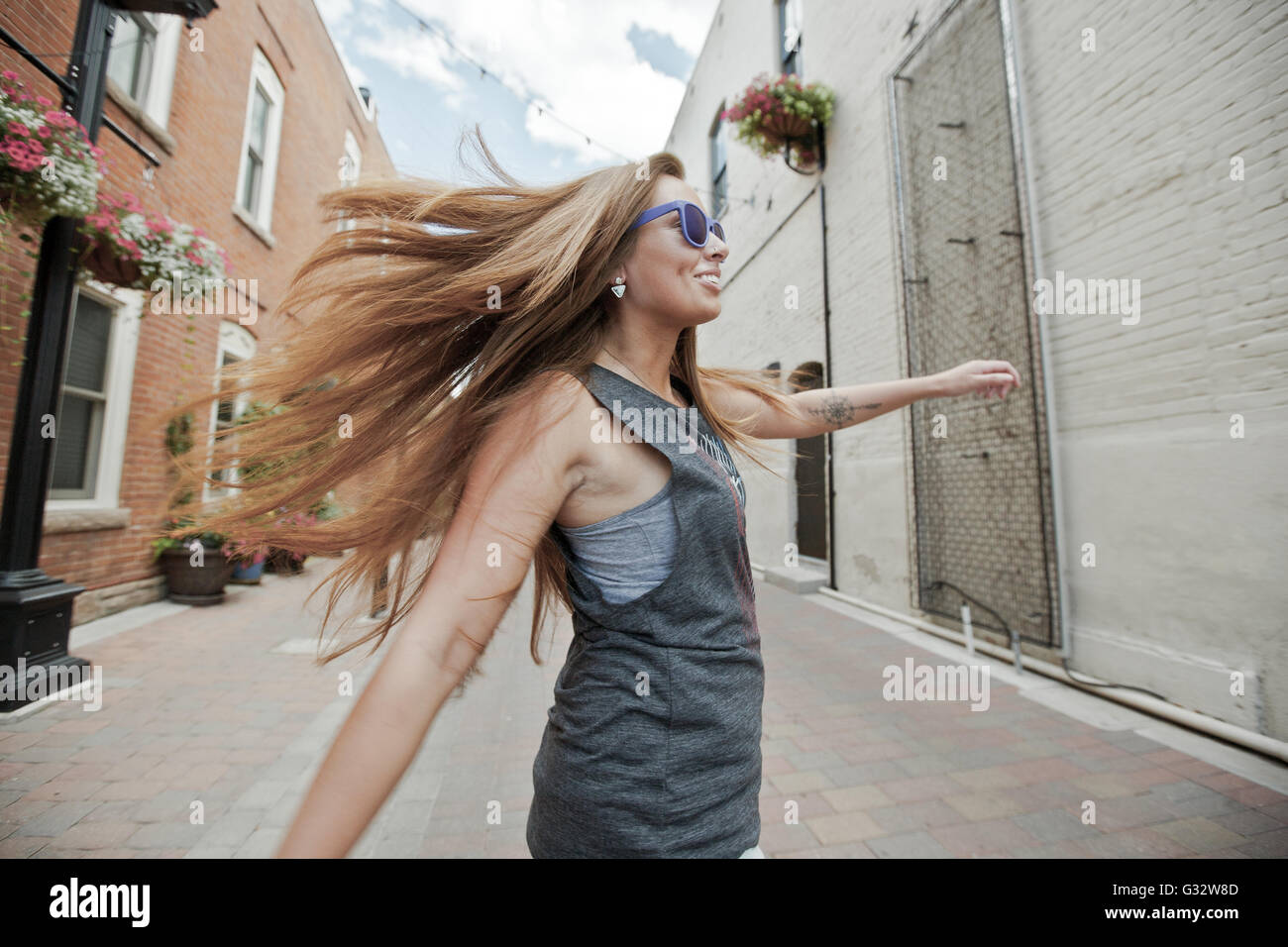 Woman spinning hi-res stock photography and images - Alamy