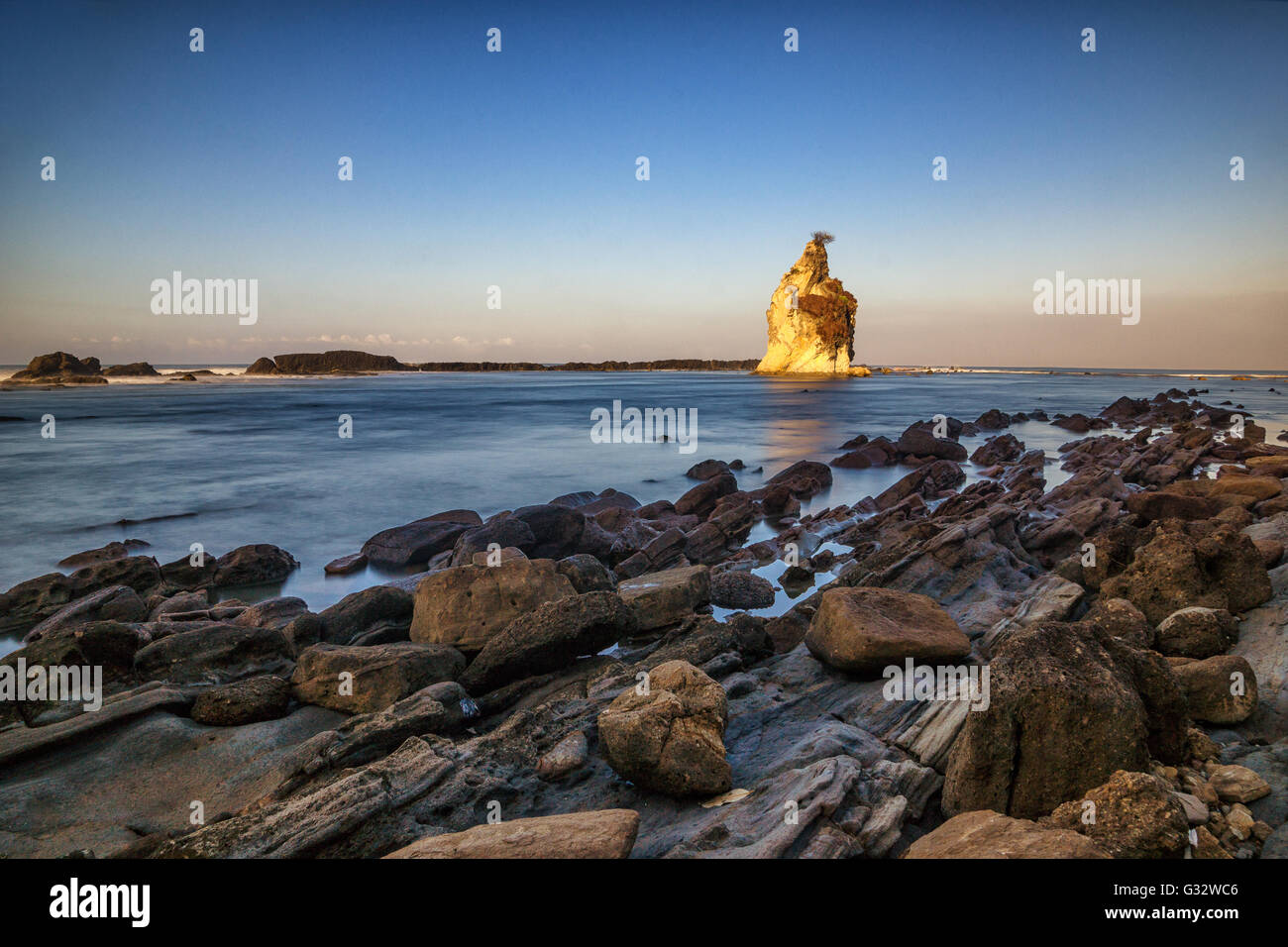 Rocks on Tanjung Karang Beach, Sawarna, Indonesia Stock Photo - Alamy