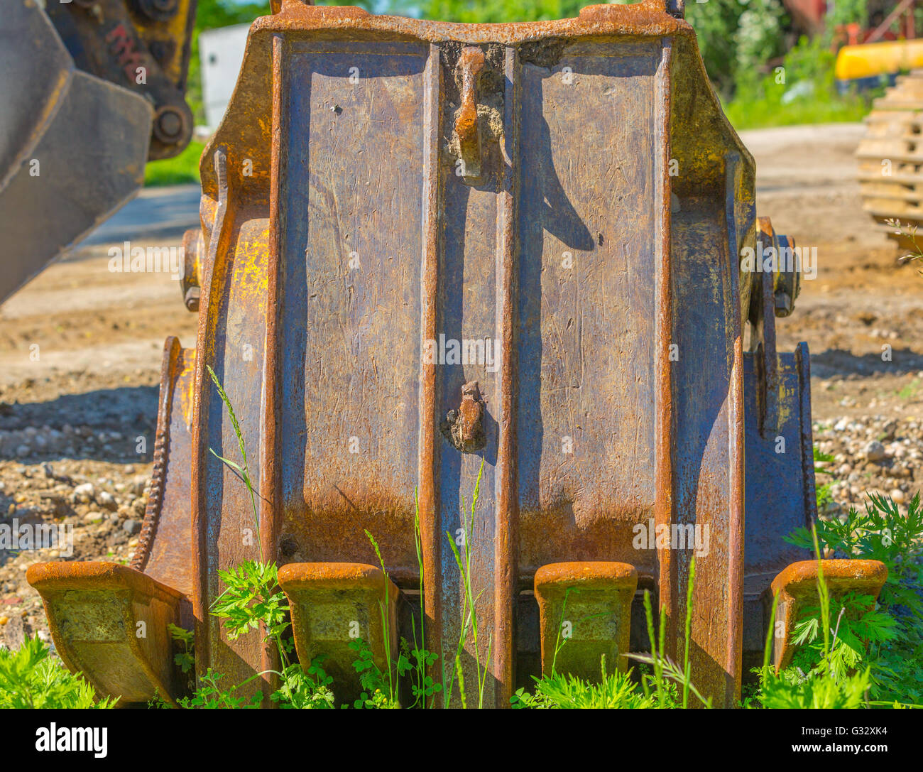 used and partially rusted backhoe steel bucket with teeth Stock Photo ...