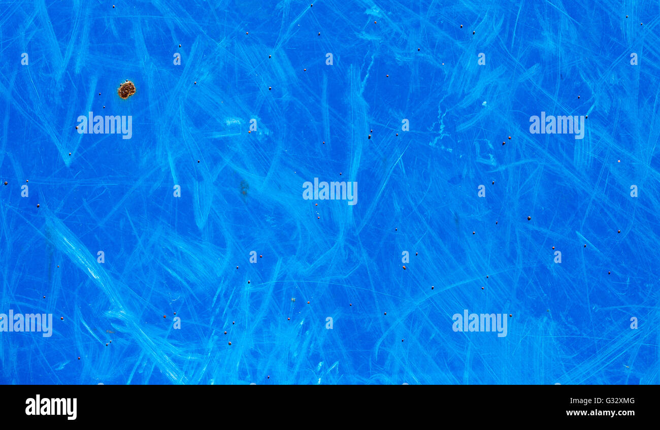 a detail image of random scratches on a blue metal panel Stock Photo ...
