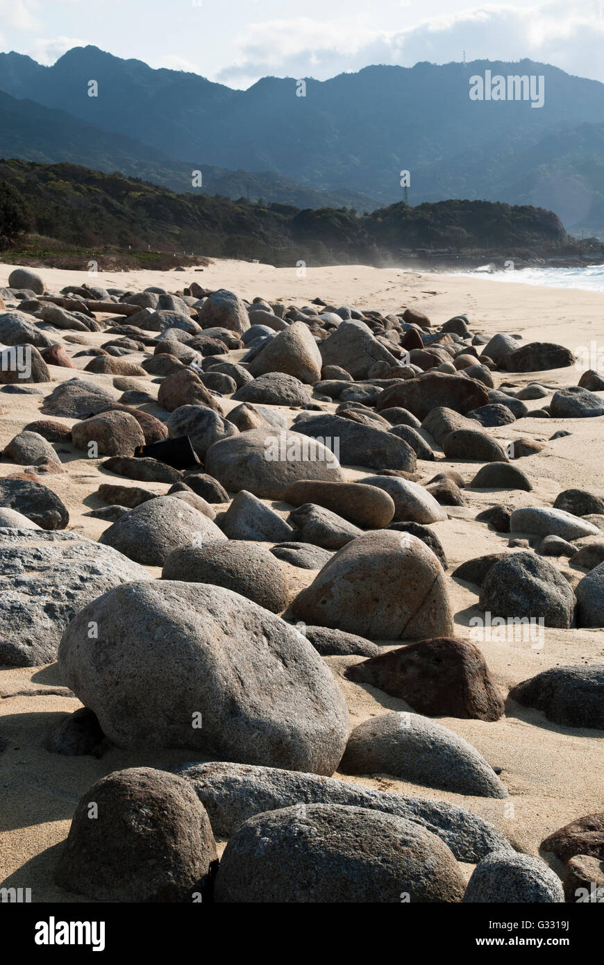 Rocks on a sand beach in Yakushima (Japan Stock Photo - Alamy