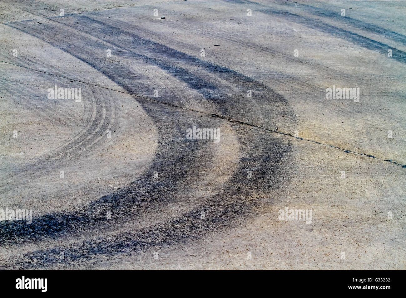 wheel track on concrete Stock Photo - Alamy