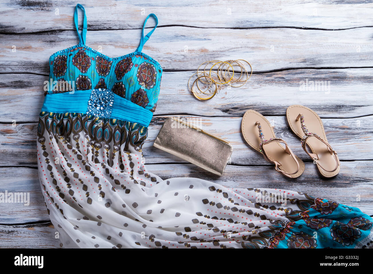 Long summer dress and sandals Stock Photo - Alamy
