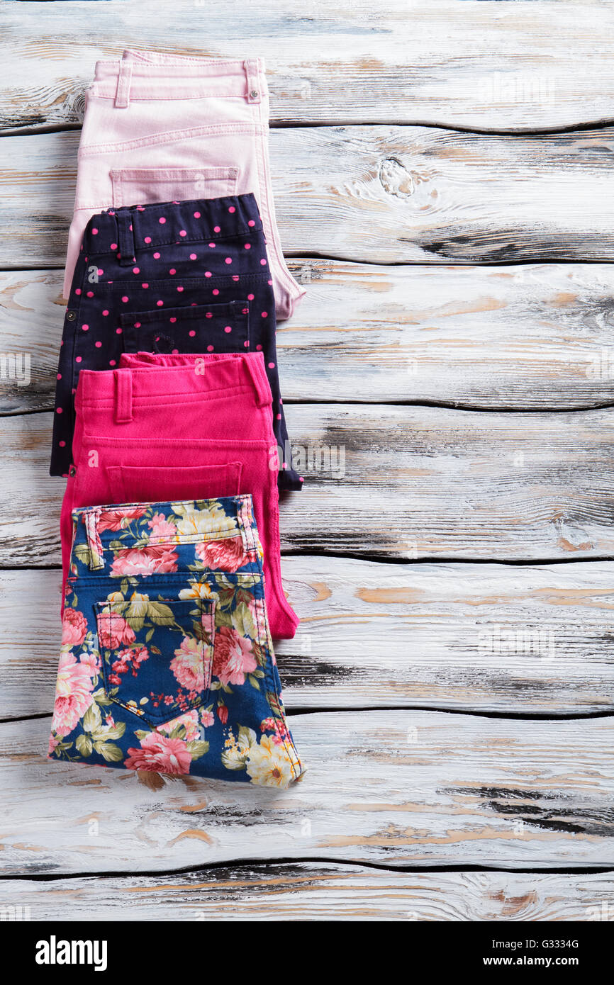 Folded pants laying closely Stock Photo - Alamy
