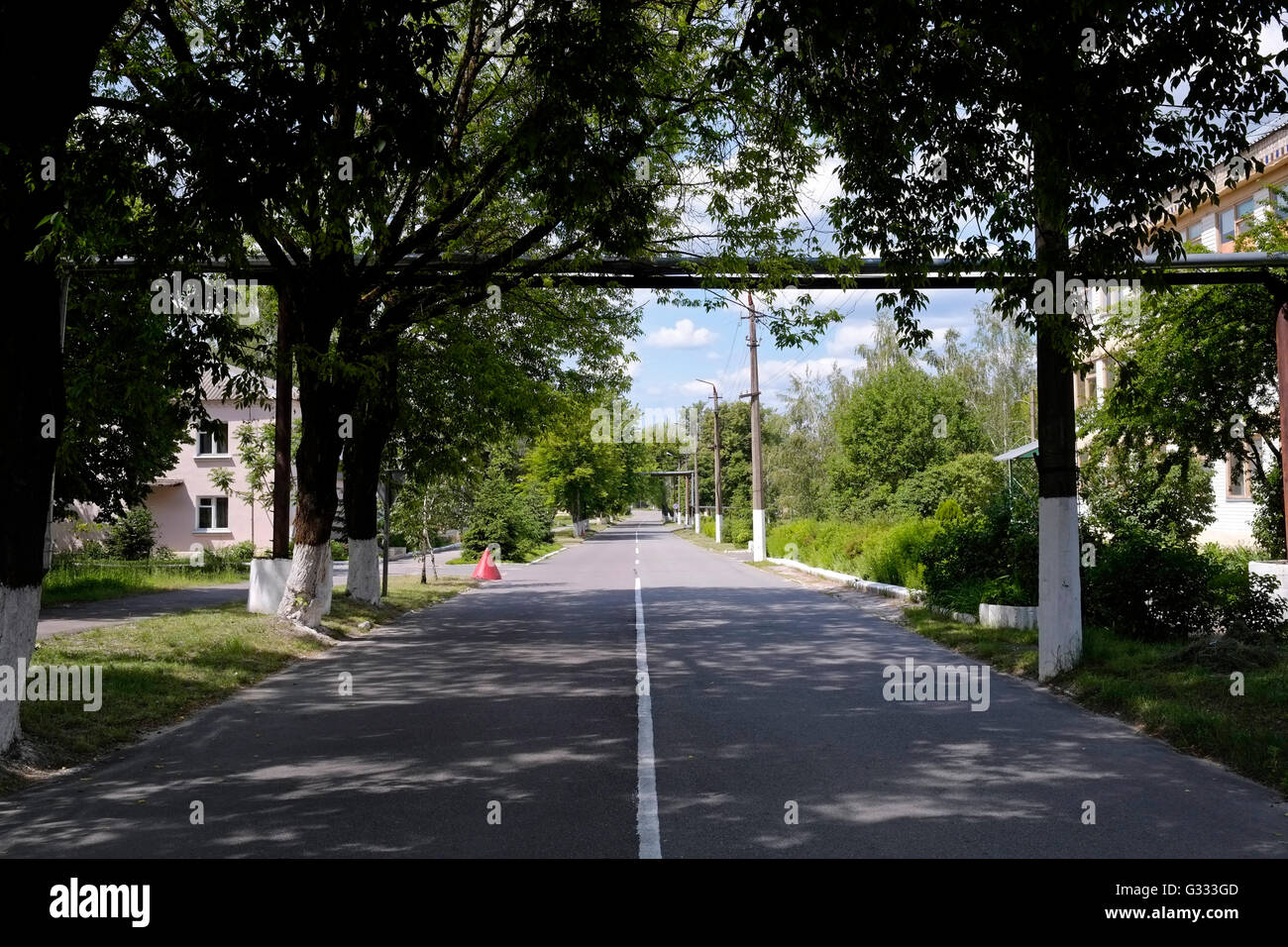 Empty road in the town of Chetnobyl located inside the Chernobyl ...