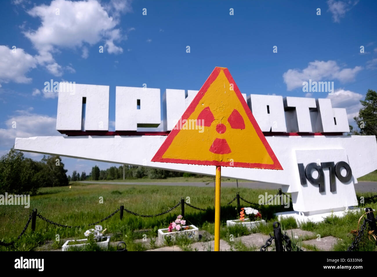 A sign warns of radiation at the city limit sign of the ghost town of ...