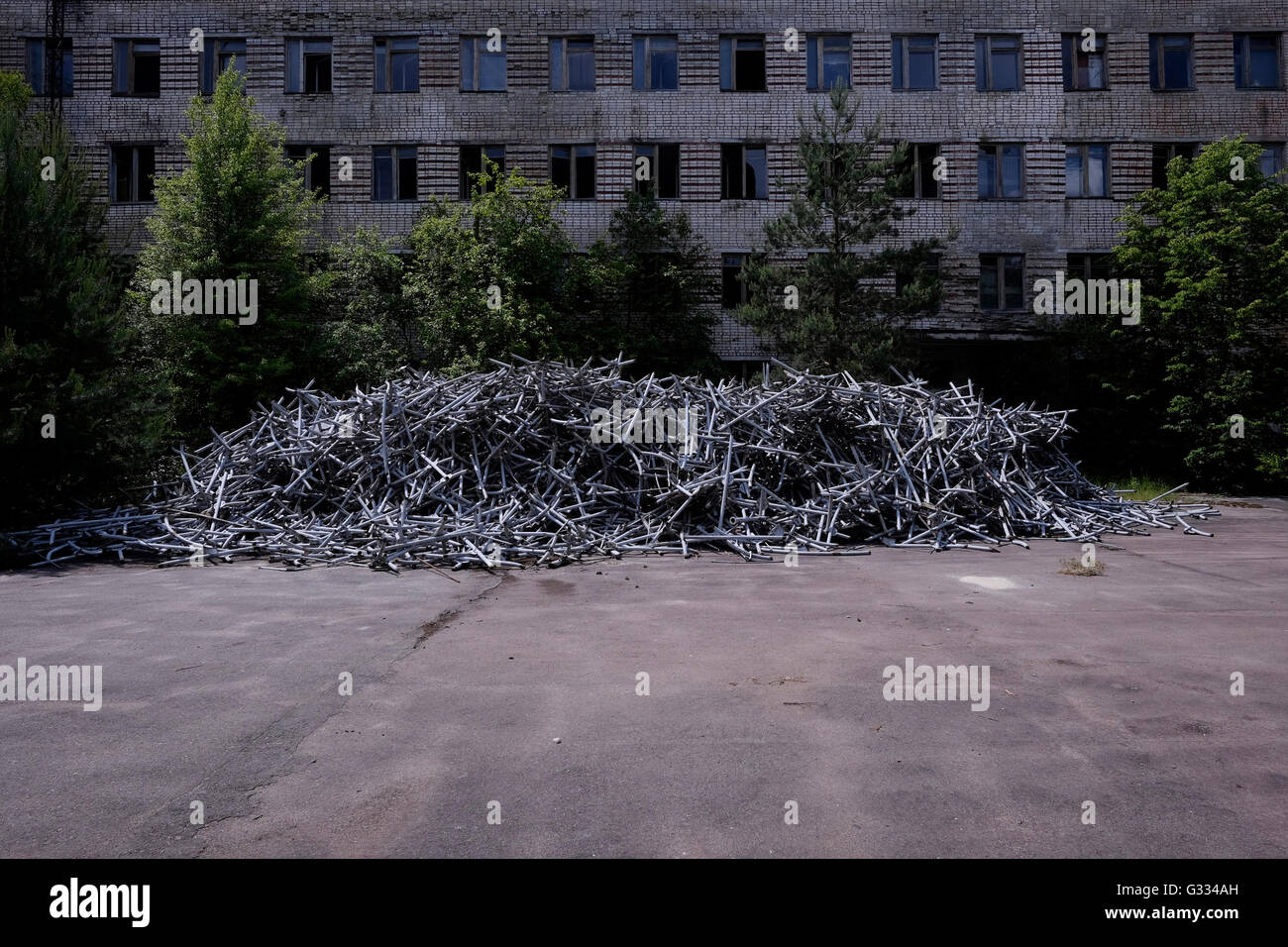 Pile of metal rubble in the deserted Chernobyl-2 military complex next ...