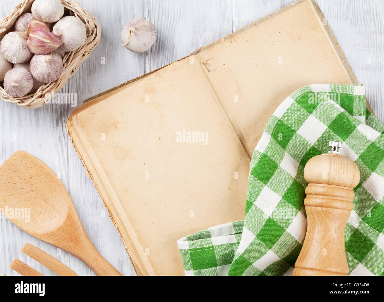 Blank vintage recipe cooking book, utensils and ingredients on wooden ...