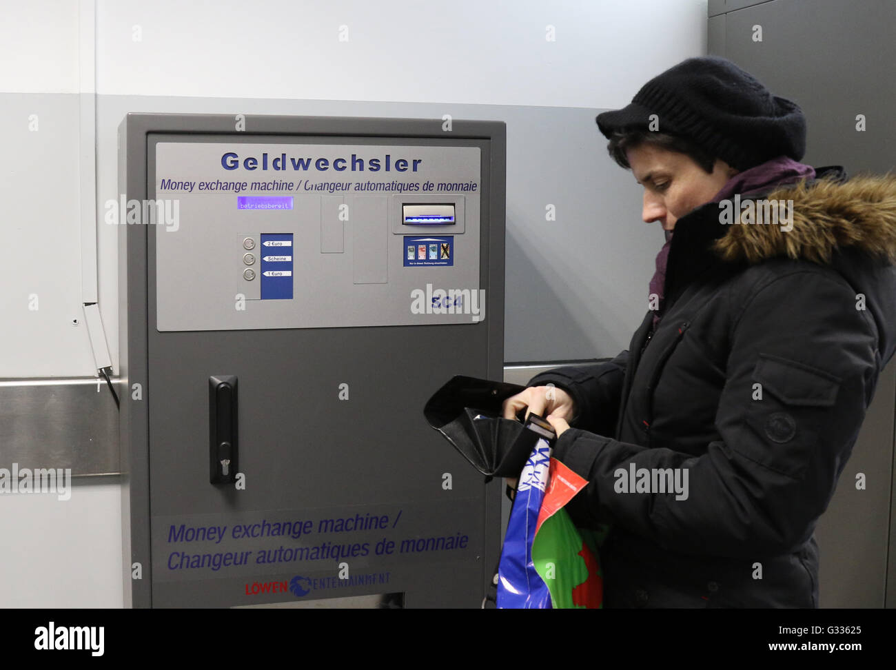 Berlin, Germany, standing in front of a change machine Stock Photo - Alamy