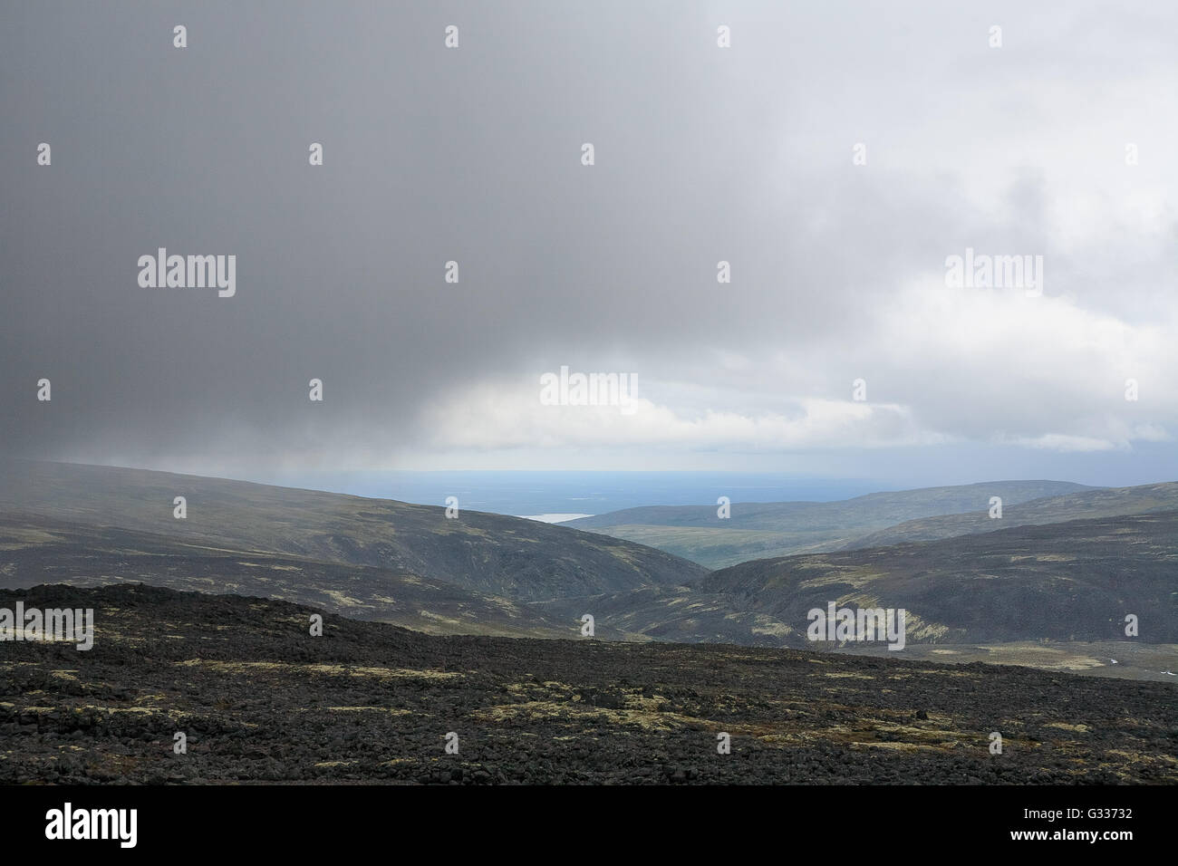 Severe beauty of Northern nature. Cloud on mountain. Summer landscape ...
