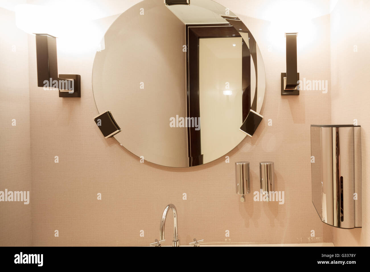 Modern office washroom interior with mirror and lamps Stock Photo - Alamy