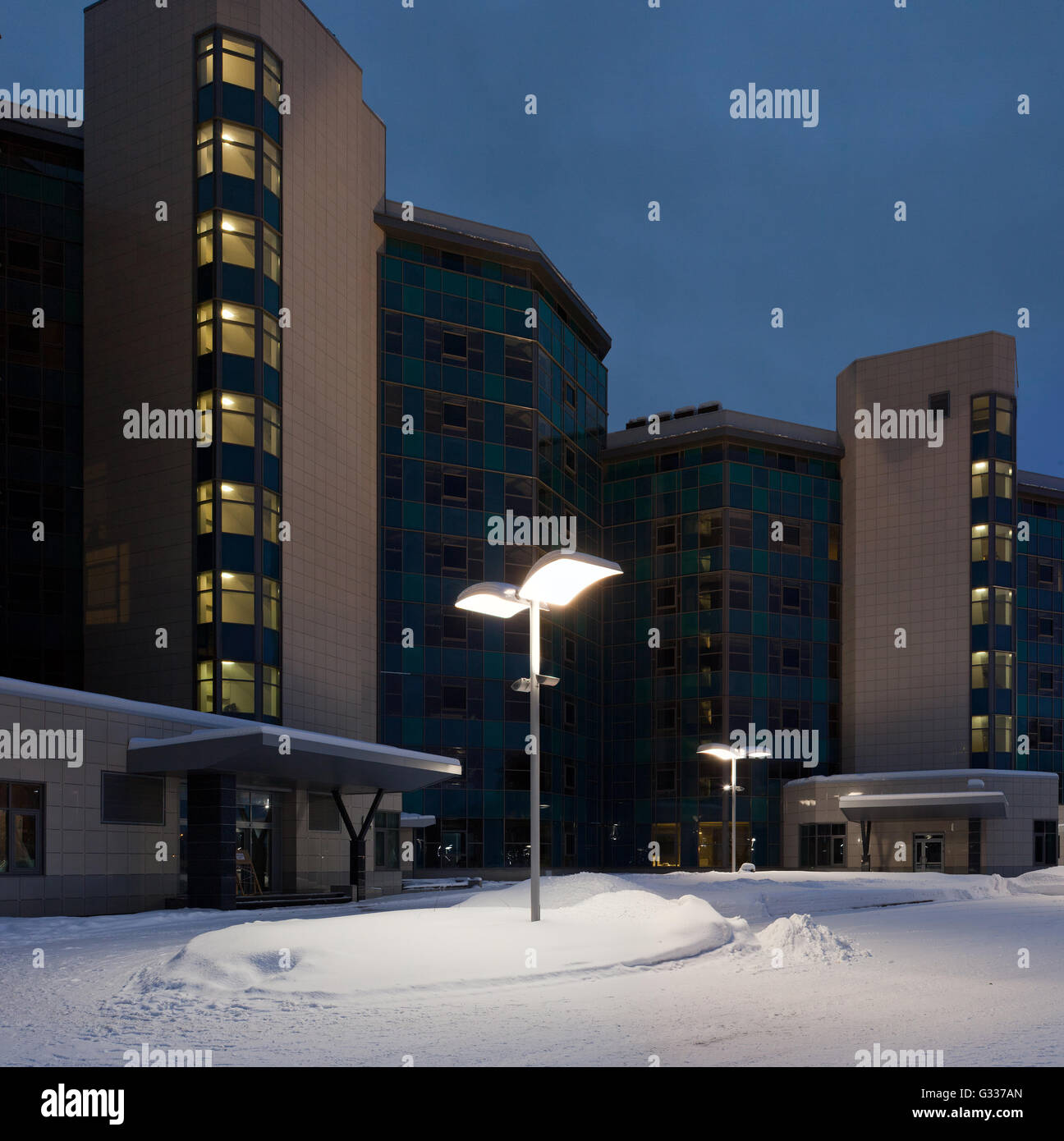 Street lamps of the office complex. Lighting supports and lamps. Winter ...