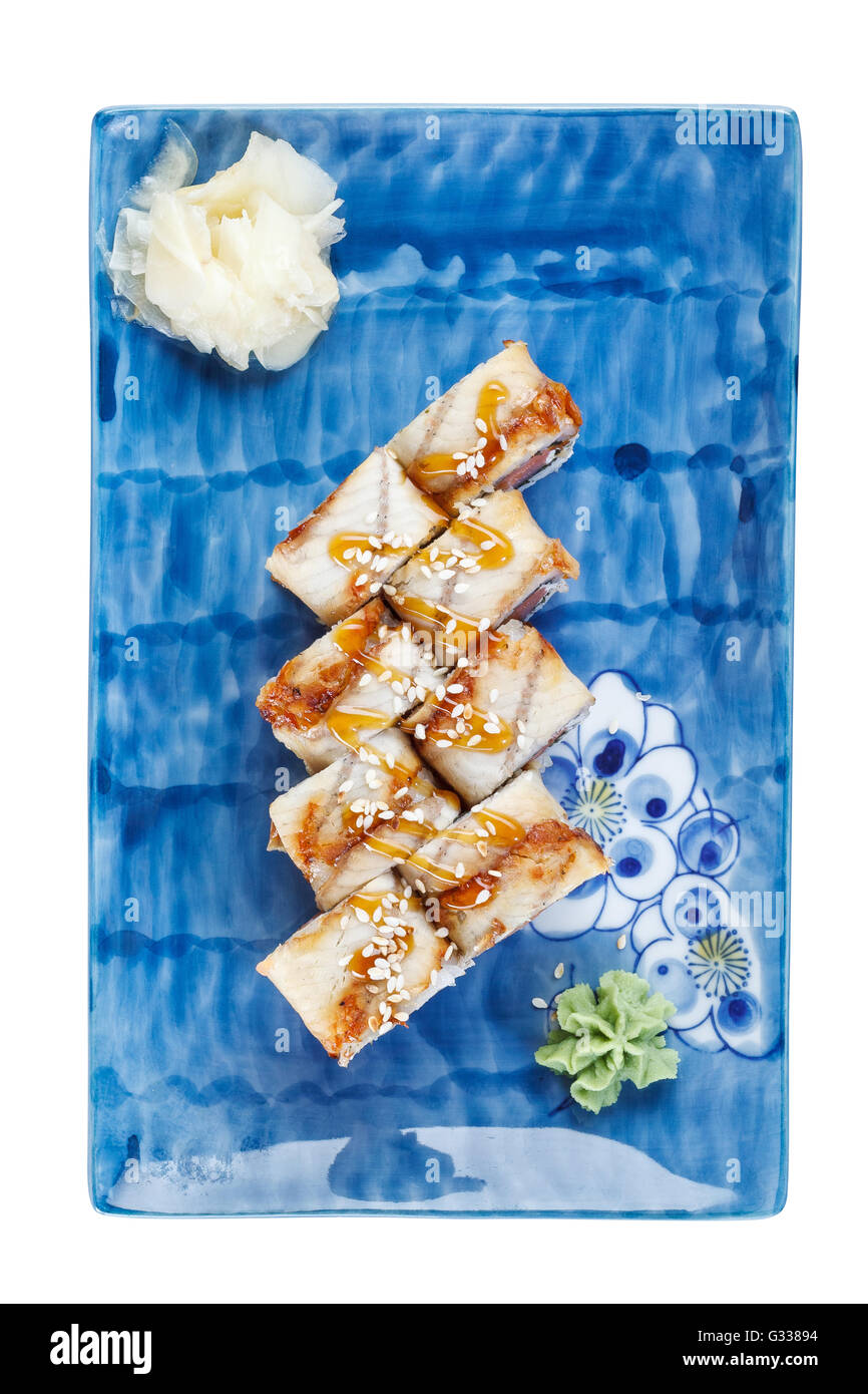 Sushi rolls with tuna and flying fish roe on a plate with wasabi and ...