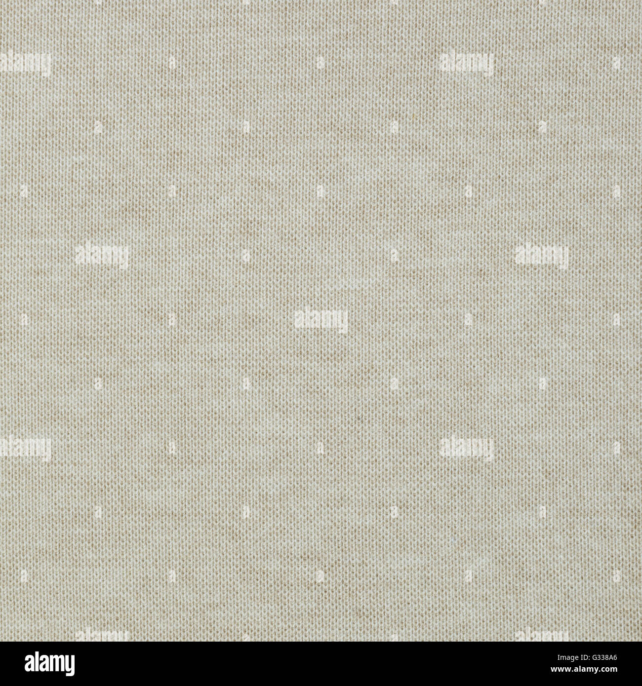 Warm grey wool knitted fabric texture. Close up fragment of the top ...