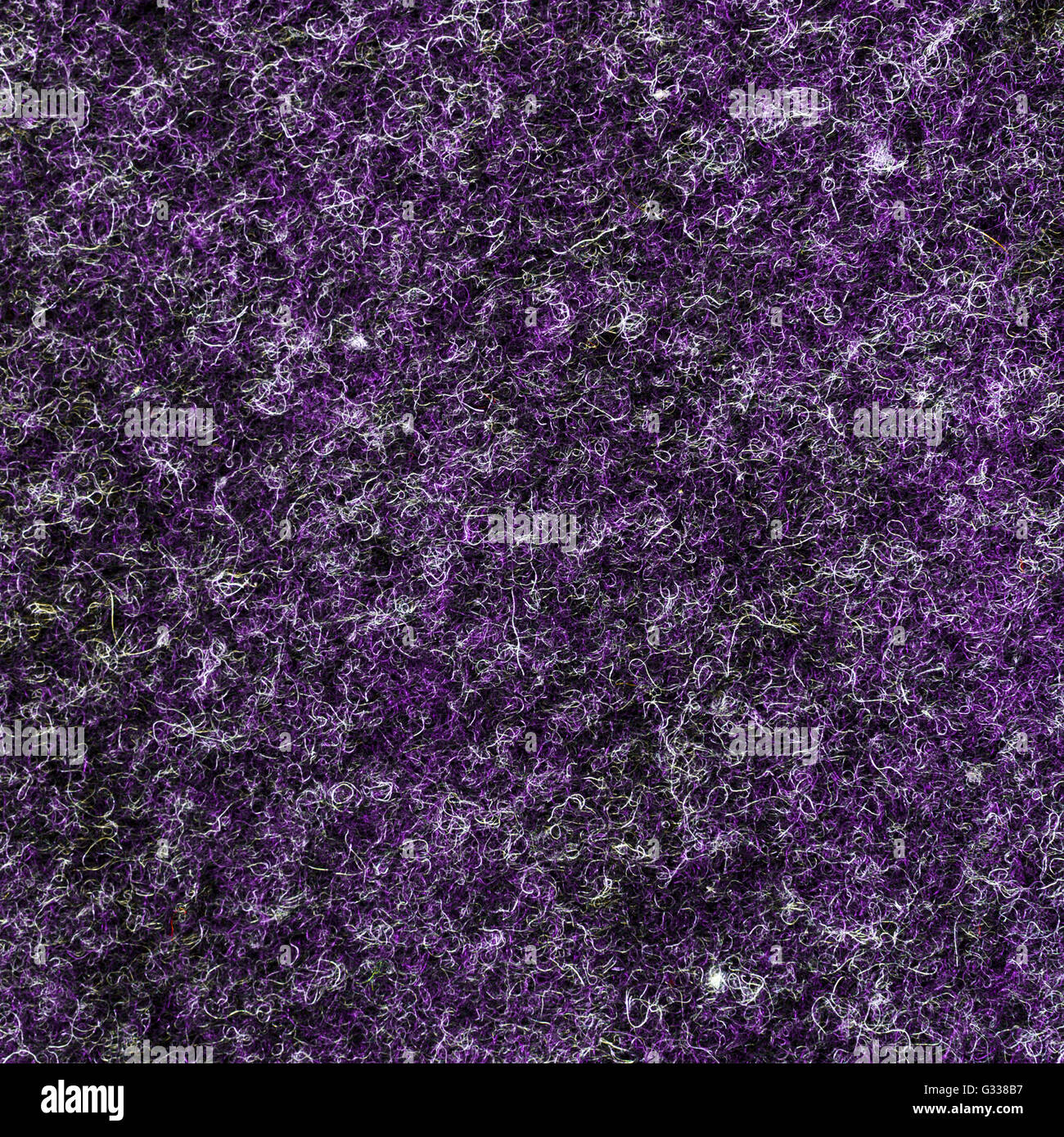 Purple fuchsia melange fuzzy woolen cloth texture. Close up fragment of ...