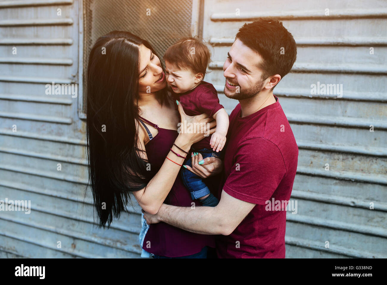 young family with a child Stock Photo - Alamy