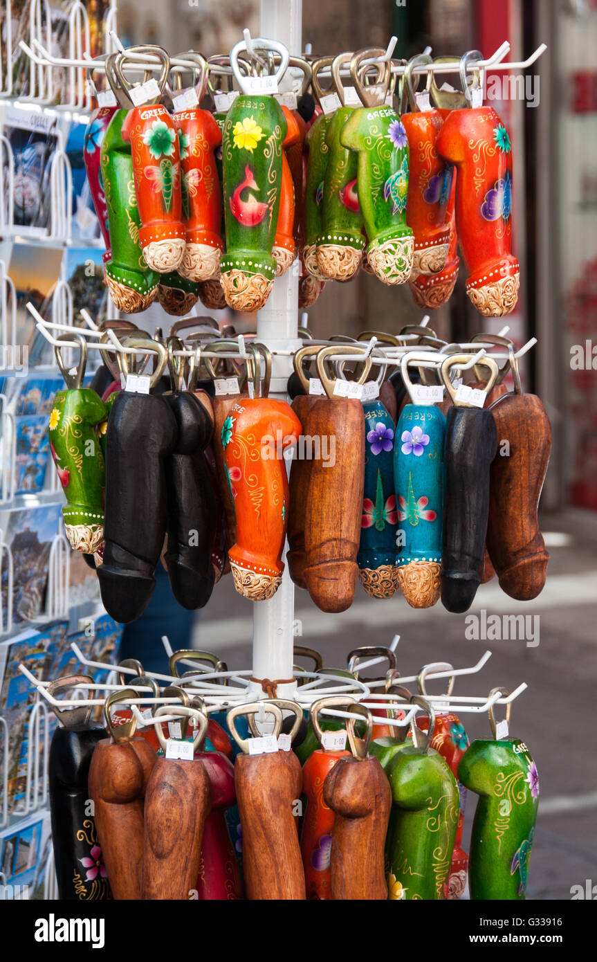 Traditional Greek Souvenir wooden phallus bottle opener on a market ...
