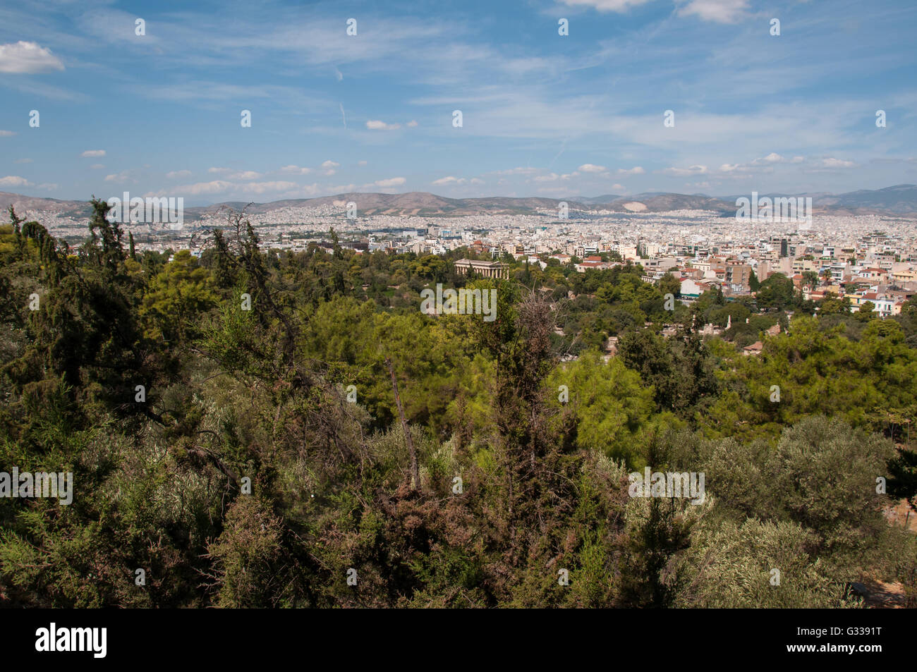 Panoramic view of the city of Athens with green trees from Acropolis ...