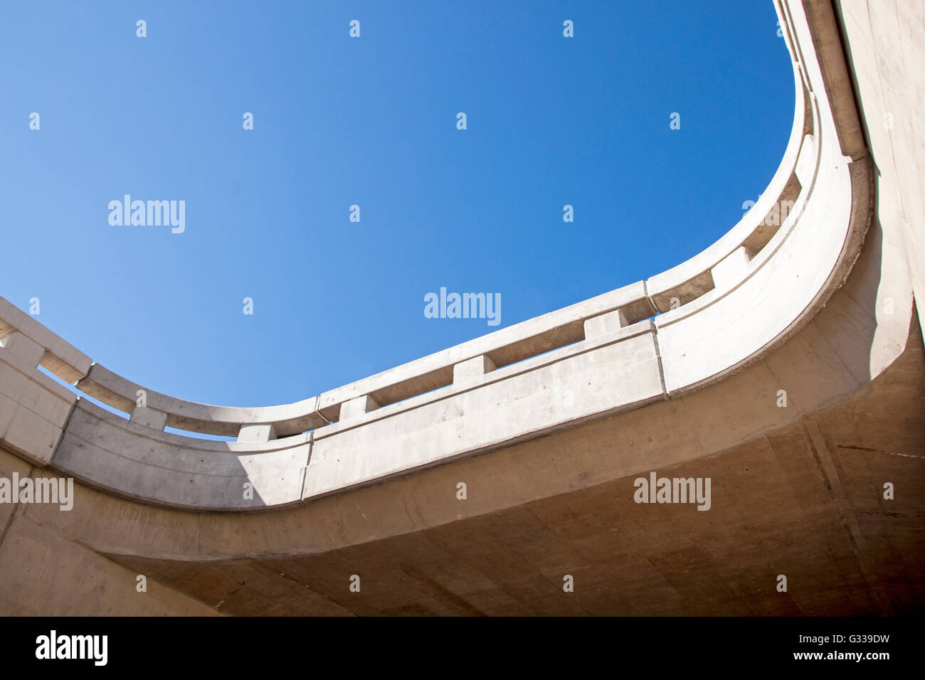 Close up under view of overhead concrete bridge construction detail ...