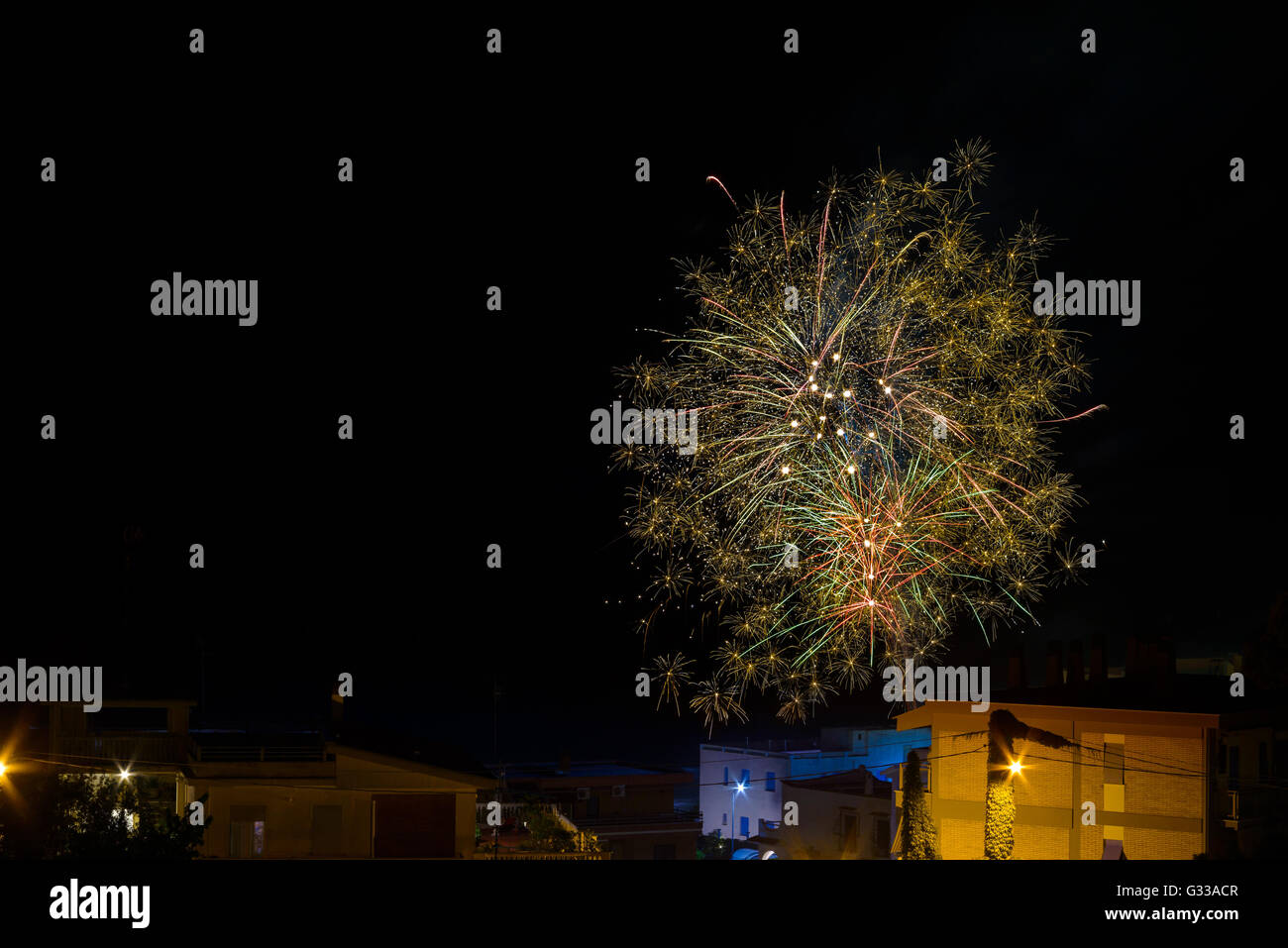 Nice and colorful fireworks in the black night Stock Photo - Alamy