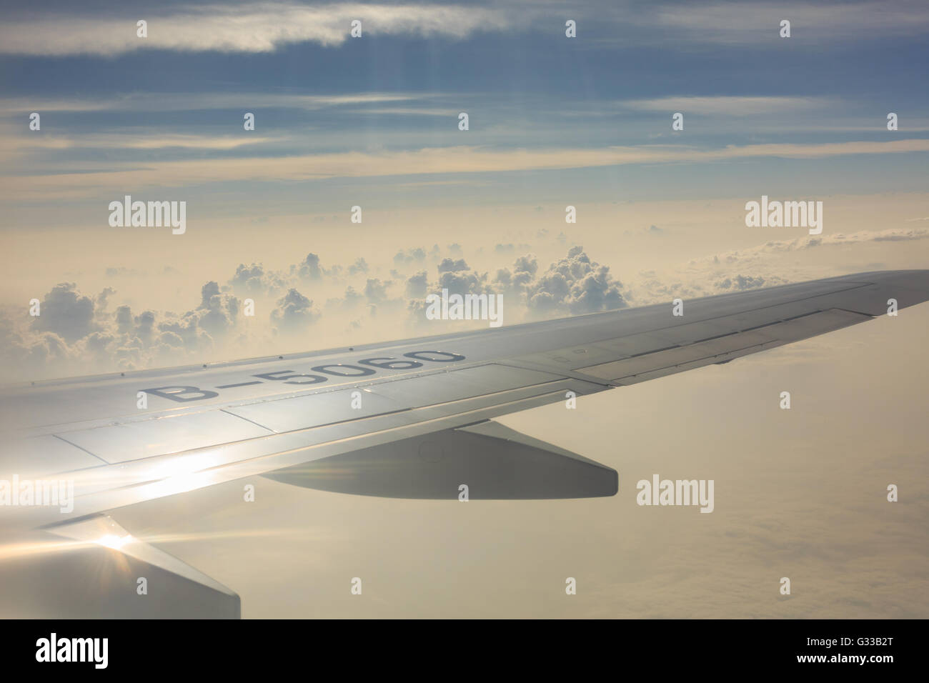 Wing of airplane from window Stock Photo - Alamy