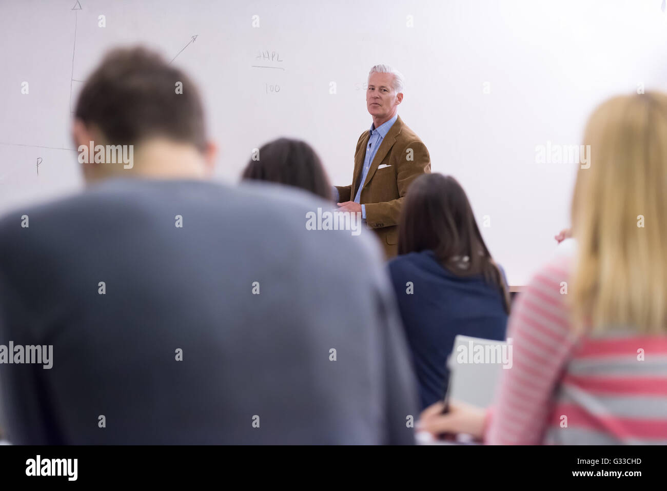 group of students study with professor in modern school classroom Stock ...