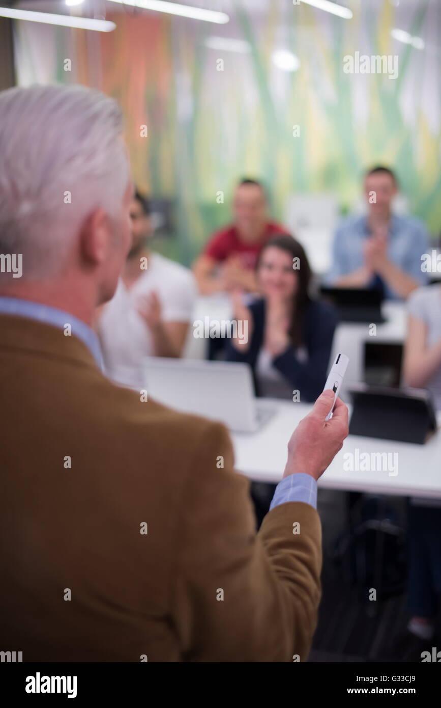 group of students study with professor in modern school classroom Stock ...