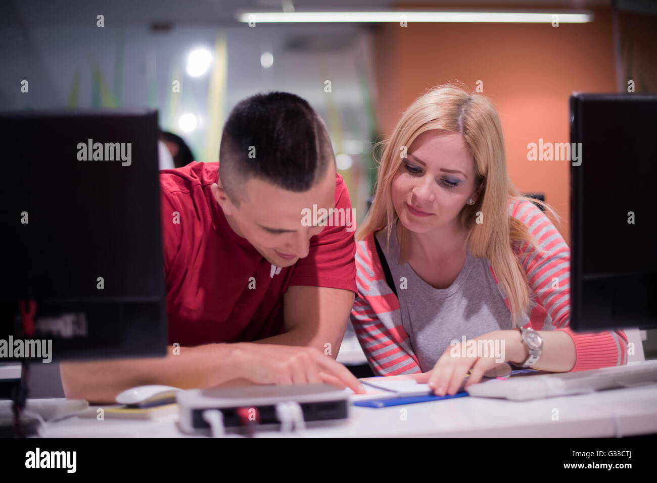 technology students group in computer lab school classroom working on ...