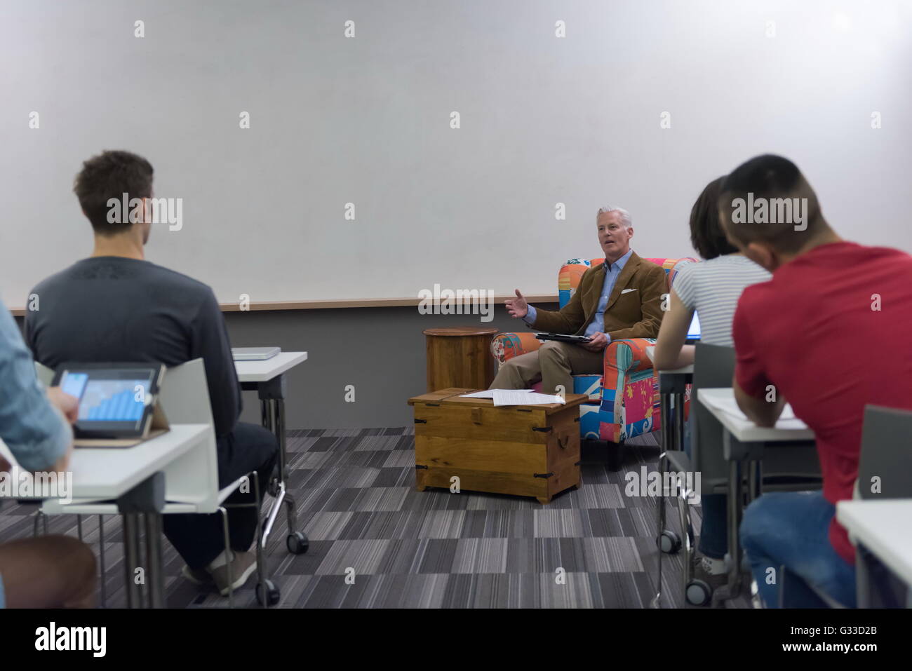 group of students study with professor in modern school classroom Stock ...