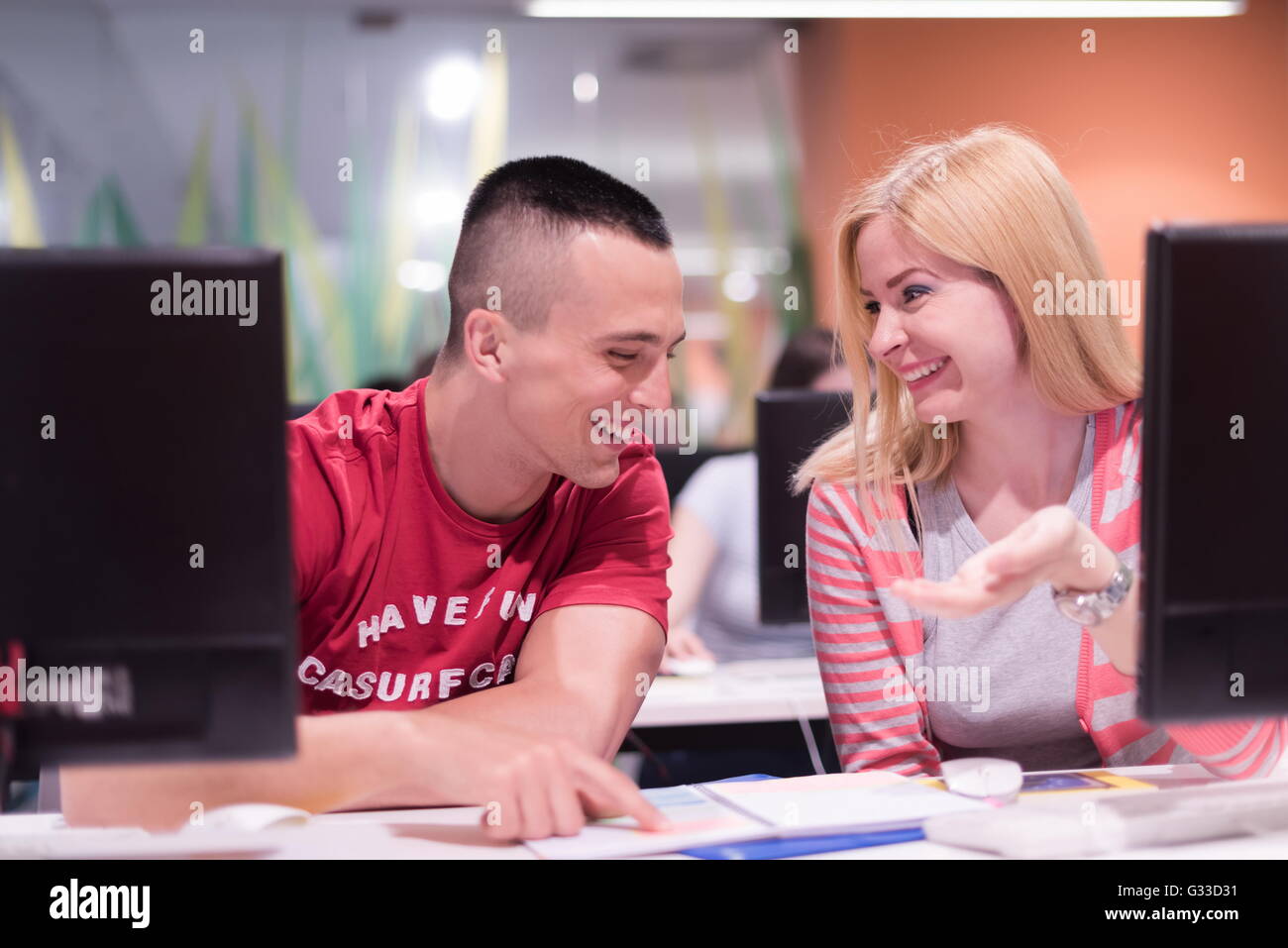 technology students group in computer lab school classroom working on ...