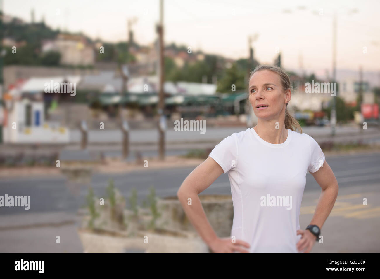 portrait of jogging woman before running on early morning with sunrise ...