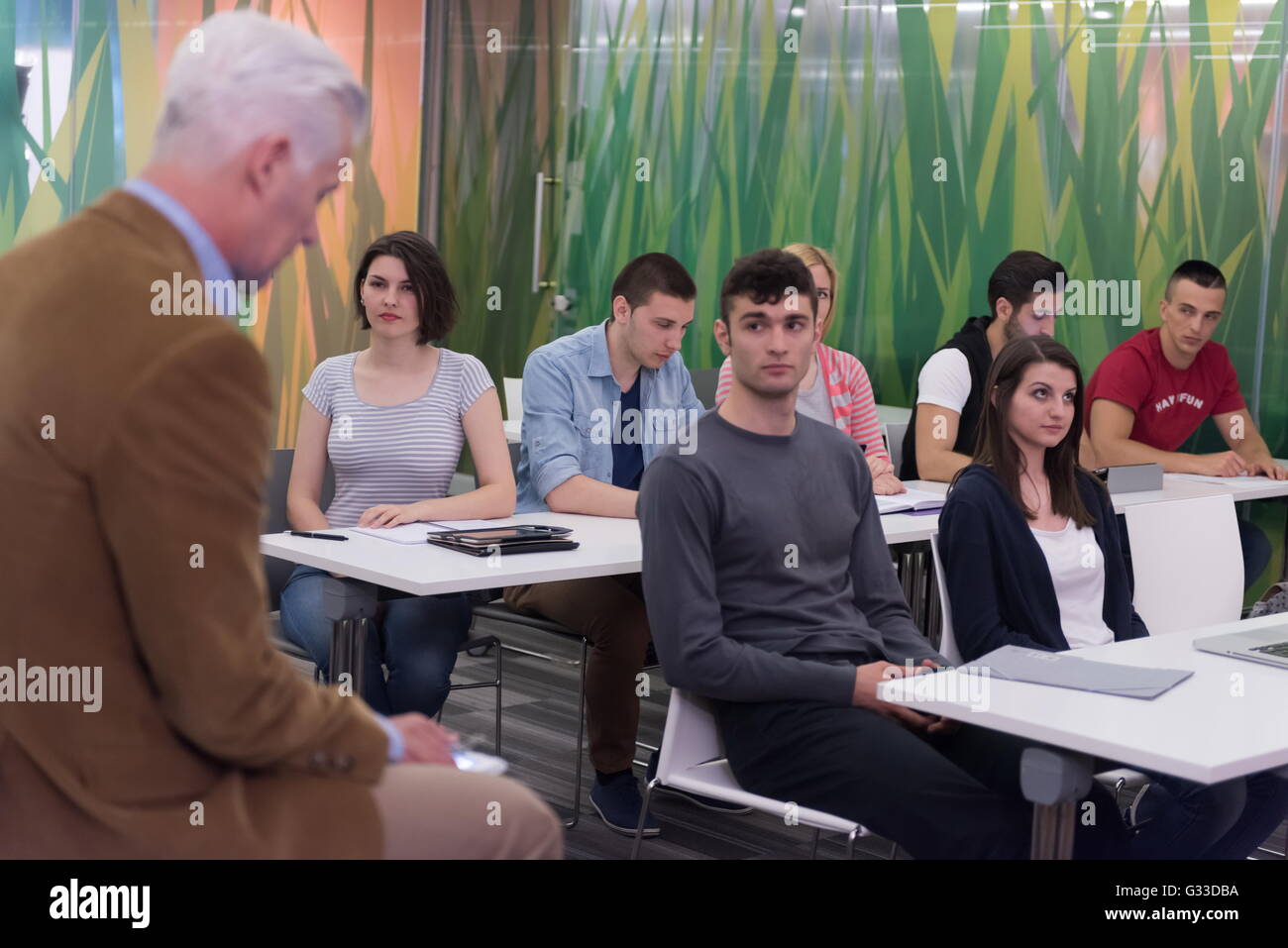 group of students study with professor in modern school classroom Stock ...