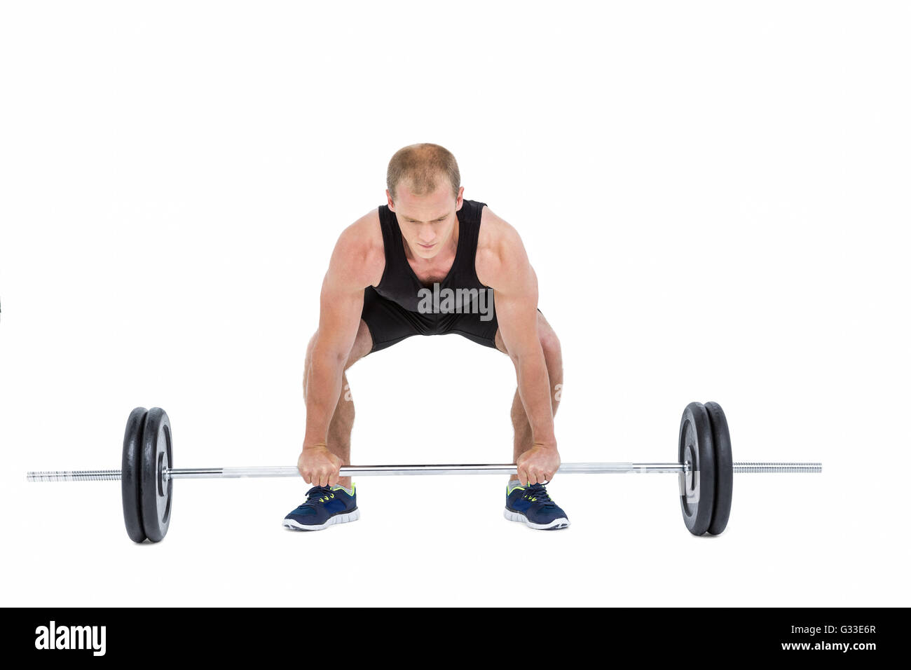 Bodybuilder lifting heavy barbell weights Stock Photo - Alamy