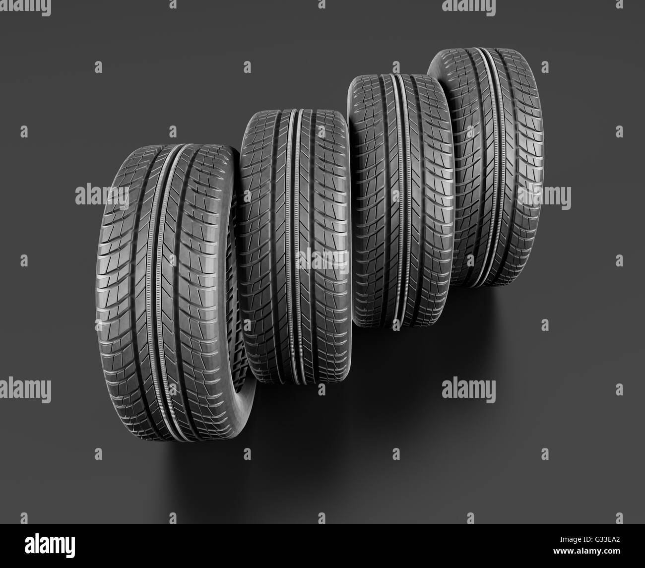 Four car tires on white background. Include clipping path. 3d ...