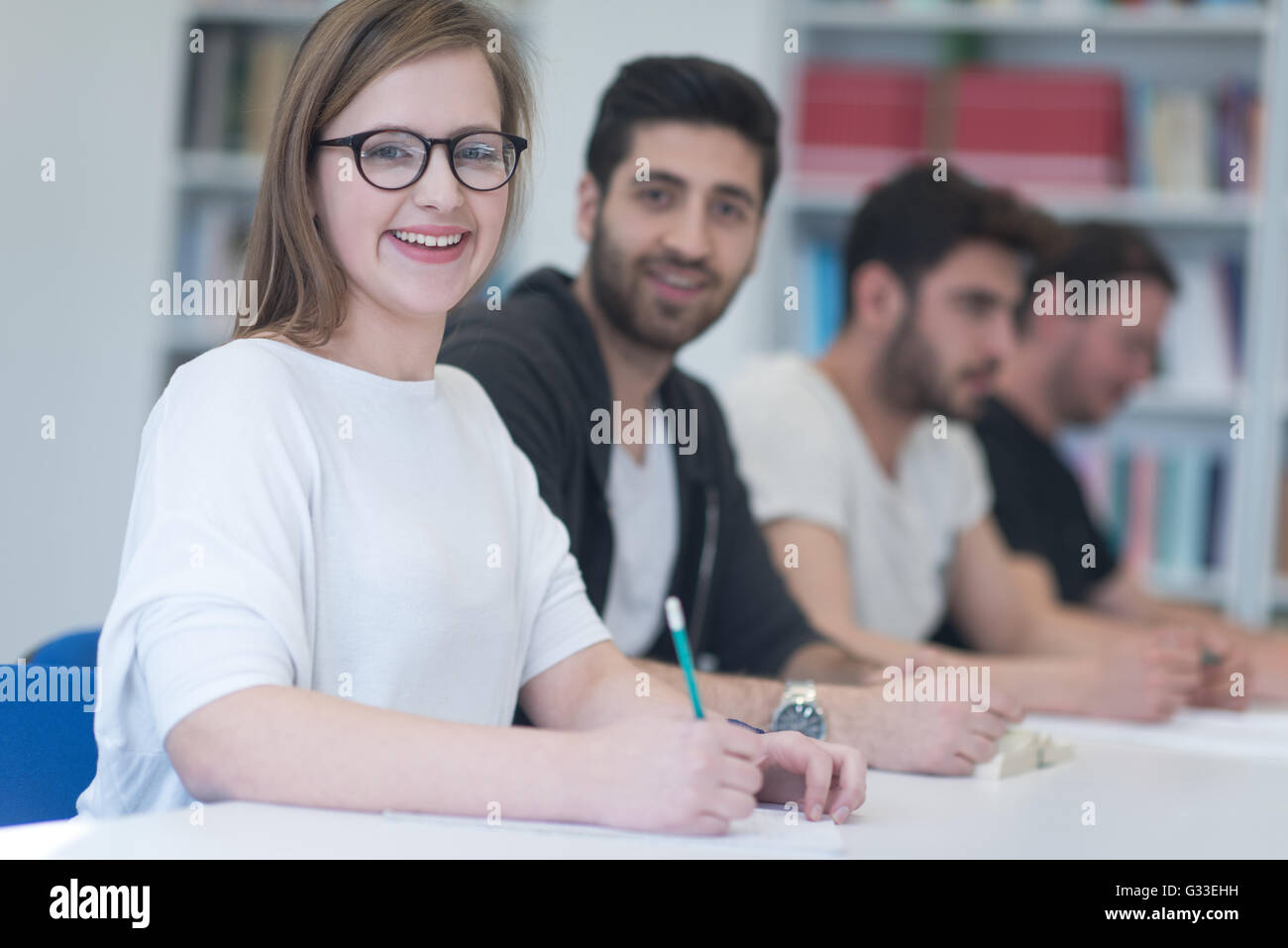 students group study together in school classroom and working together ...