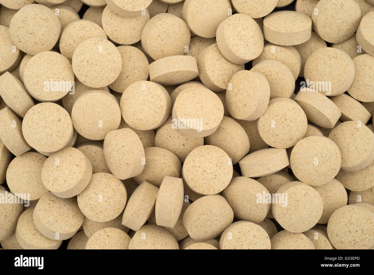 A very close view of brewer's yeast nutritional supplement tablets ...